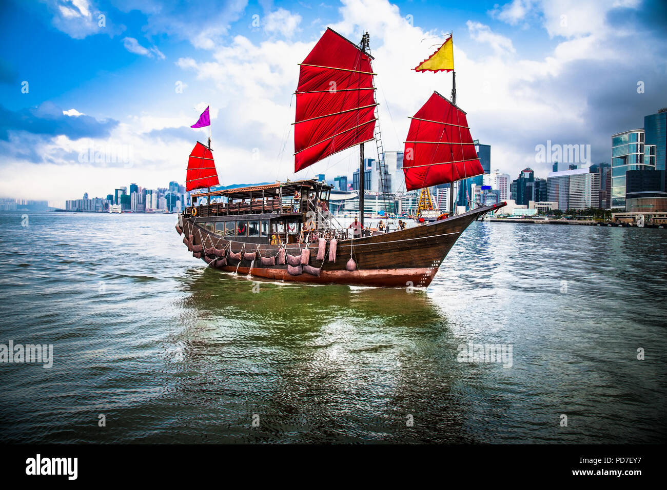 Traditional Chinese wooden sailing ship with red sails in Victoria ...