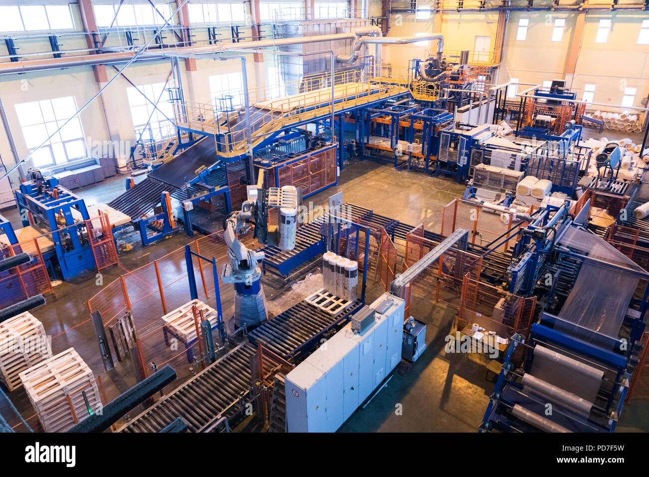 Fiberglass production industry equipment at manufacture background ...