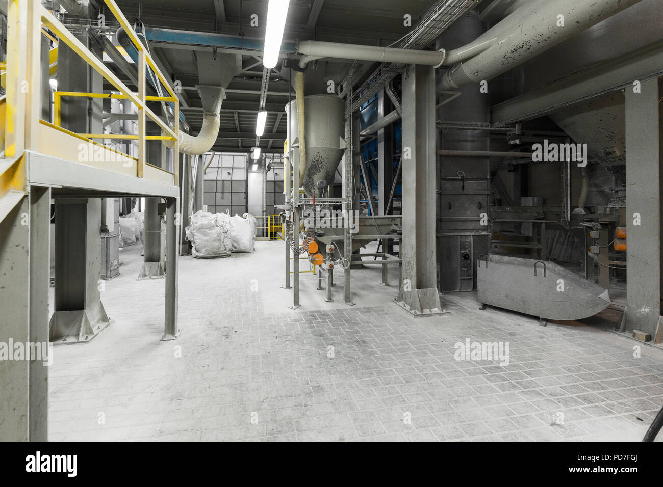 Fiberglass production industry equipment at manufacture background ...