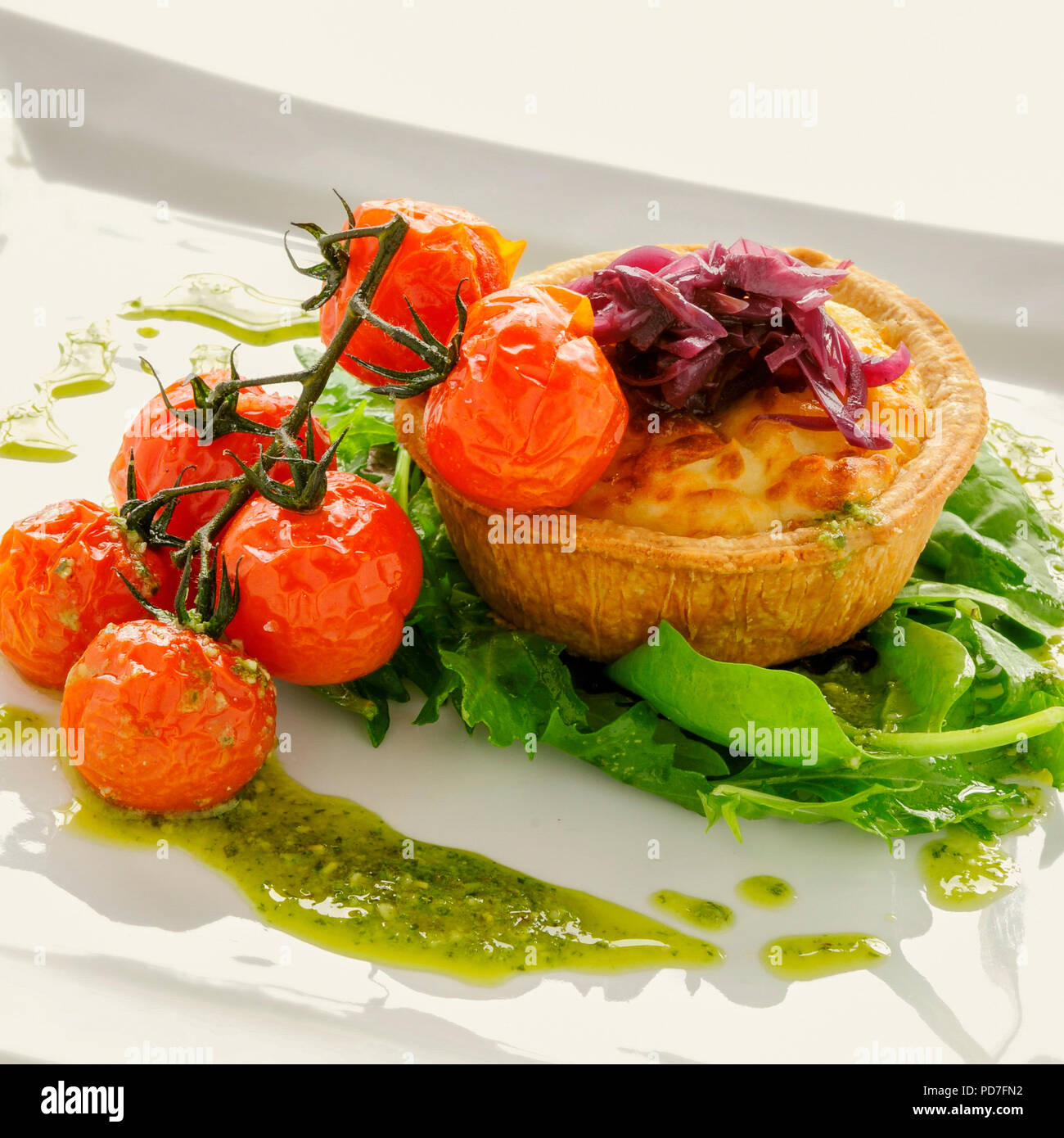 plated savoury tarts Stock Photo - Alamy