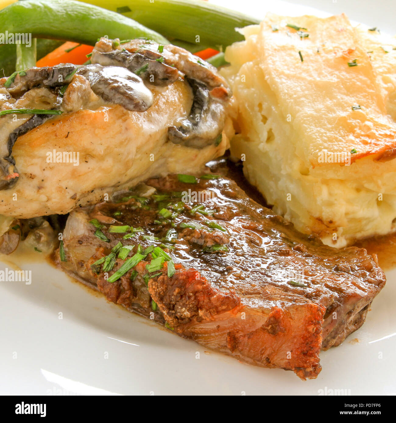 plated chicken main meal Stock Photo - Alamy