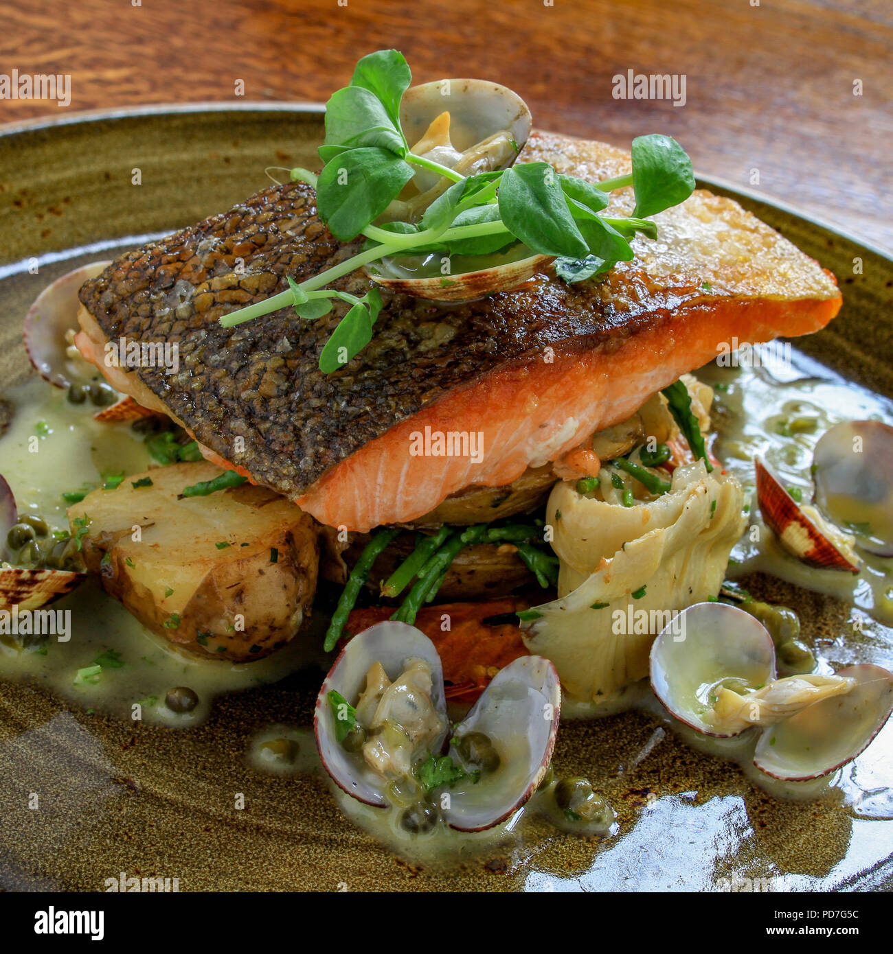 Plated fish steak meal hi-res stock photography and images - Alamy