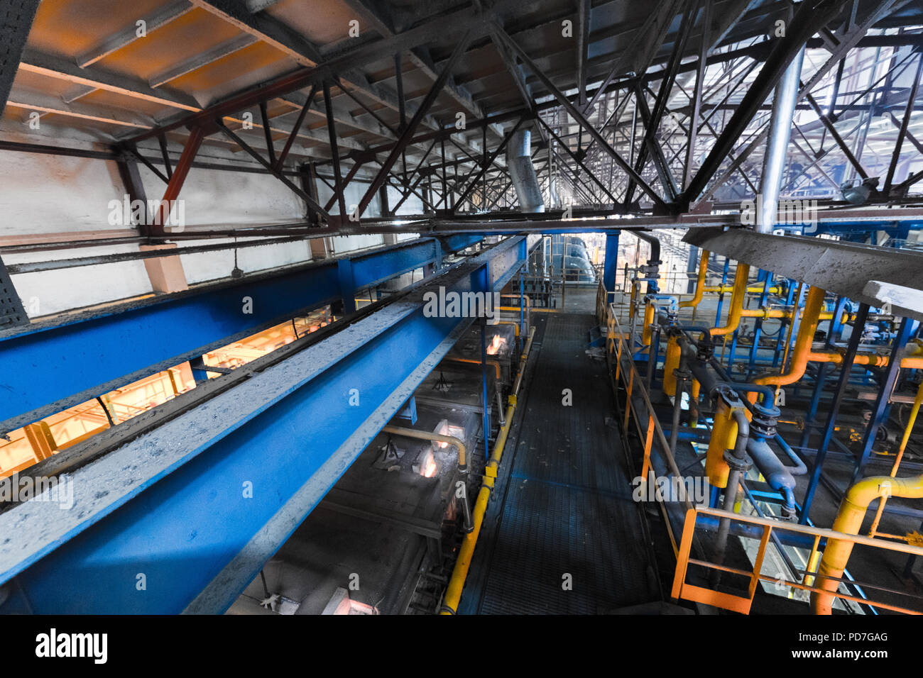 Fiberglass production industry equipment at manufacture background ...