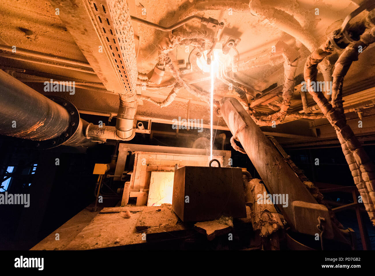 Process of fiberglass production at manufacture background with ...