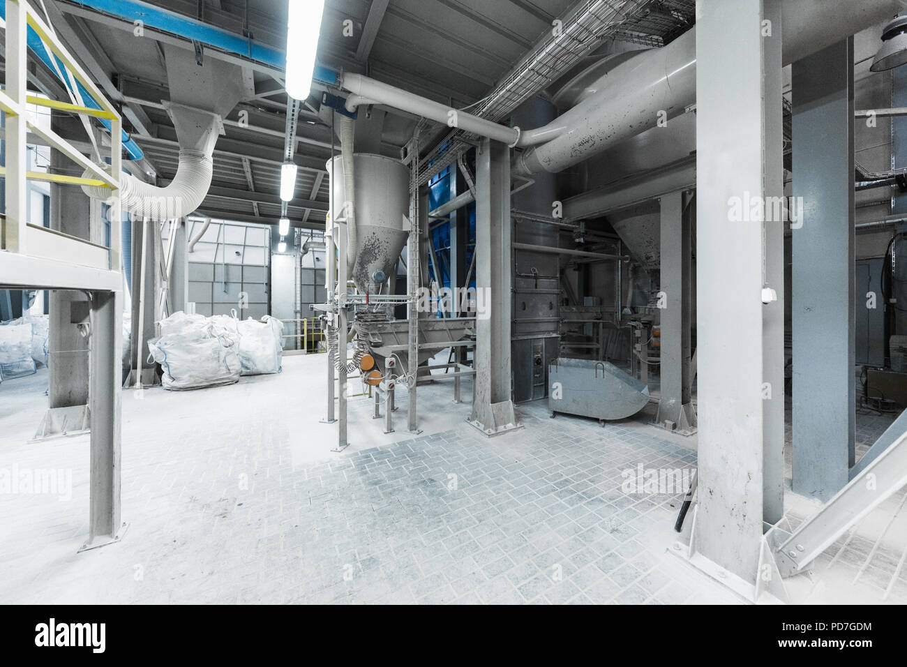 Fiberglass production industry equipment at manufacture background ...