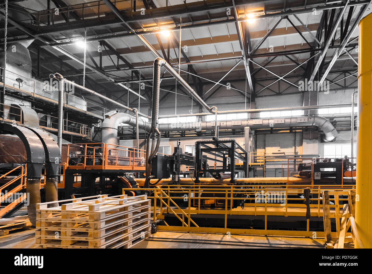 Fiberglass production industry equipment at manufacture background ...