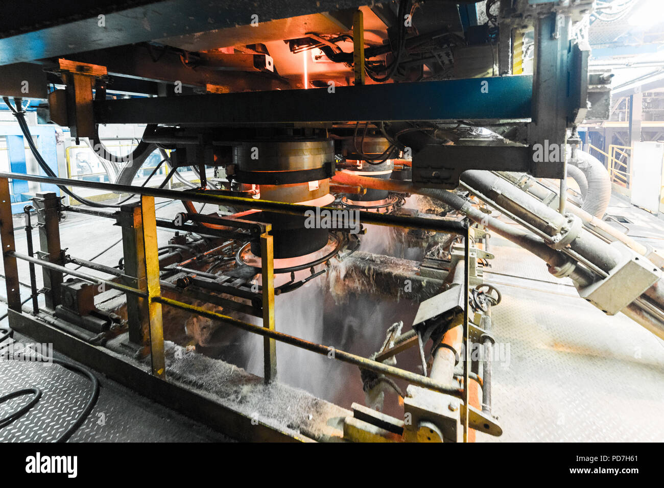 Fiberglass production industry equipment at manufacture background ...