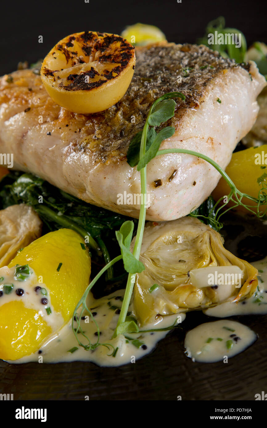 plated fish cod loin main meal Stock Photo - Alamy