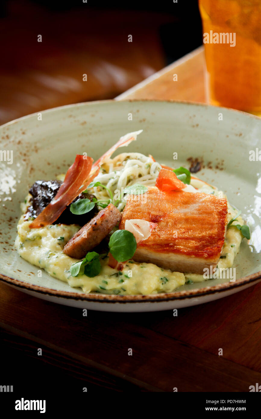 plated pork belly main Stock Photo - Alamy