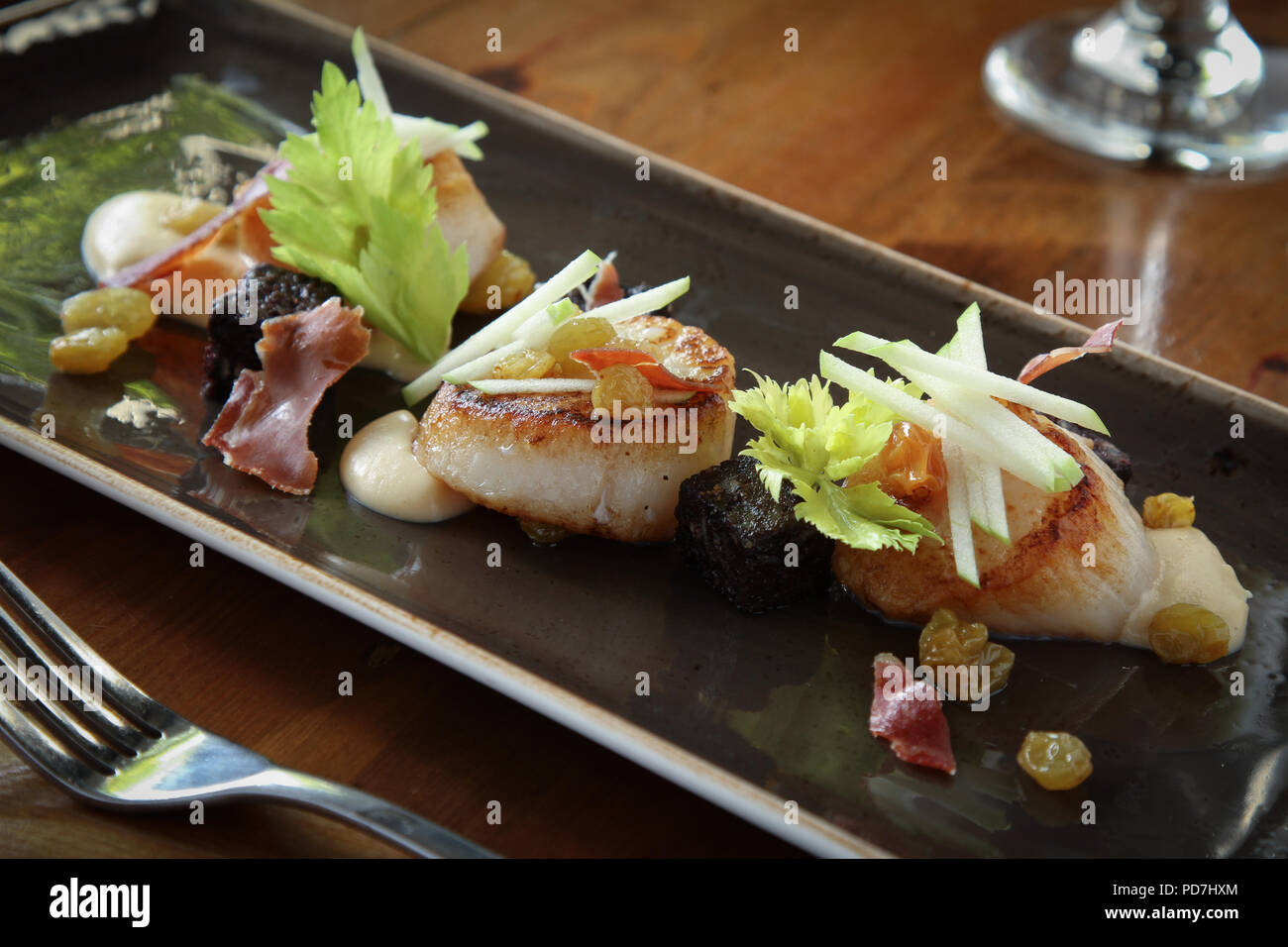 pan fried scallop appetizer Stock Photo - Alamy