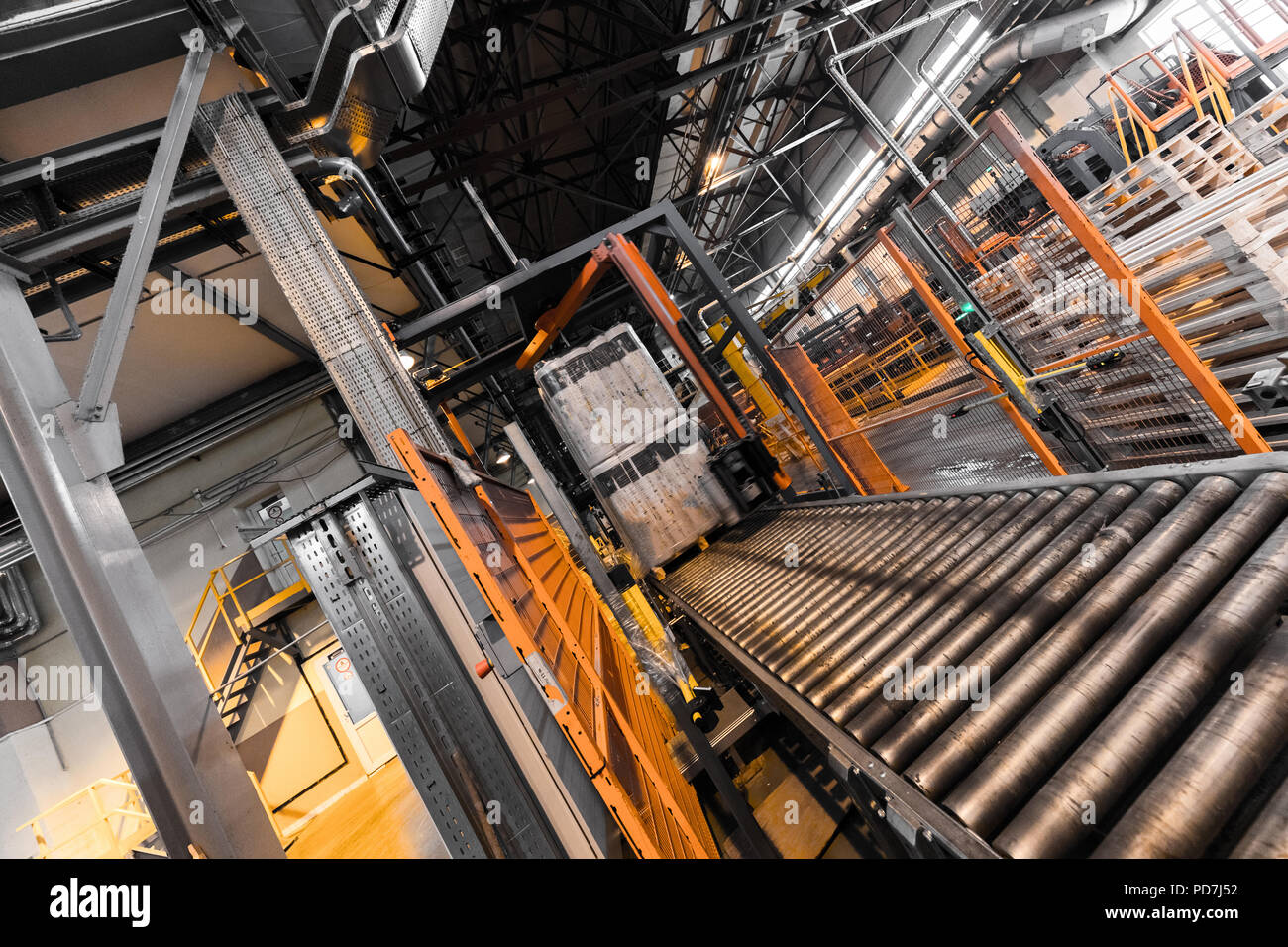 Fiberglass production industry equipment at manufacture background ...