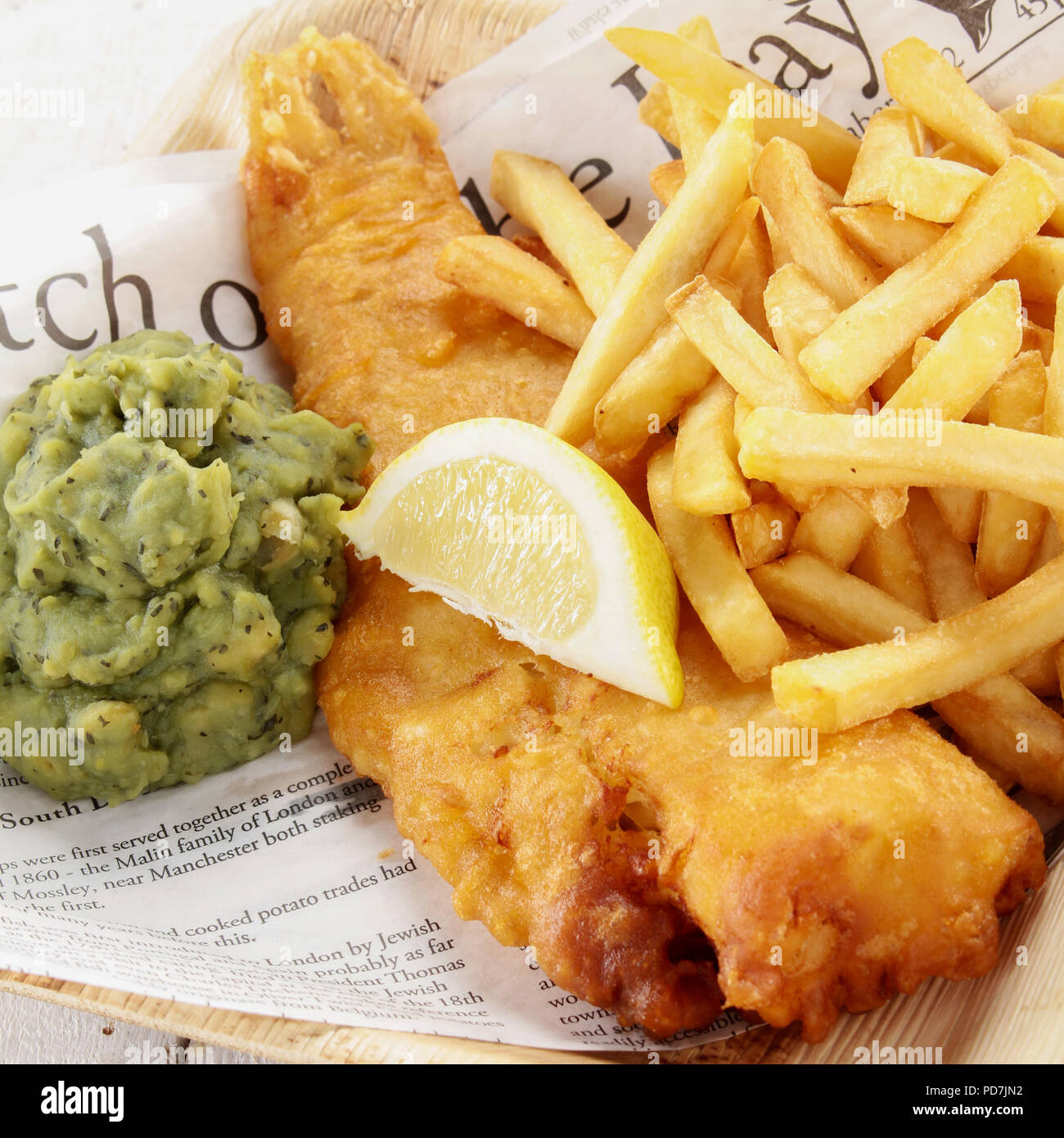 traditional british battered fish and chips Stock Photo - Alamy
