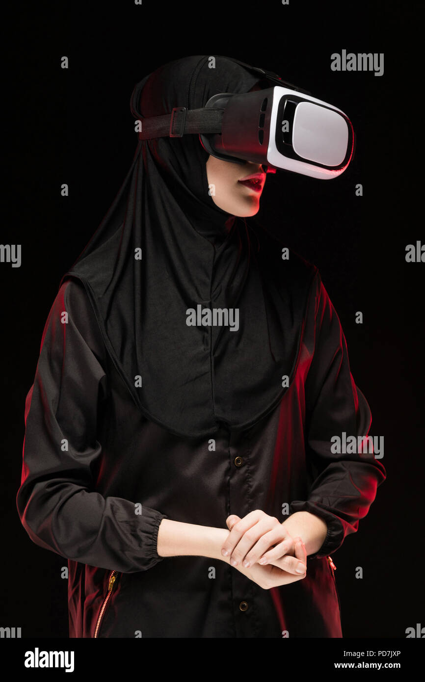 Portrait of beautiful smart young muslim woman wearing black hijab ...