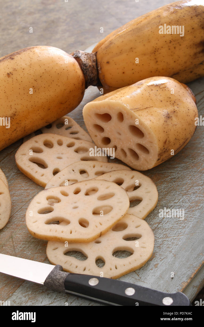preparing lotus root vegetable Stock Photo - Alamy