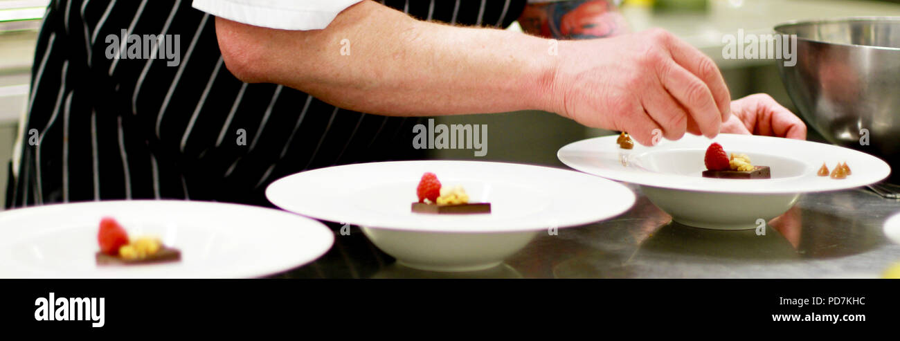 chef plating chocolate dessert Stock Photo - Alamy