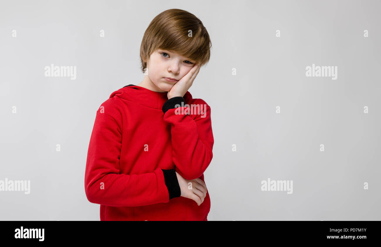 Sad teenage boy in fashionable clothes Stock Photo - Alamy