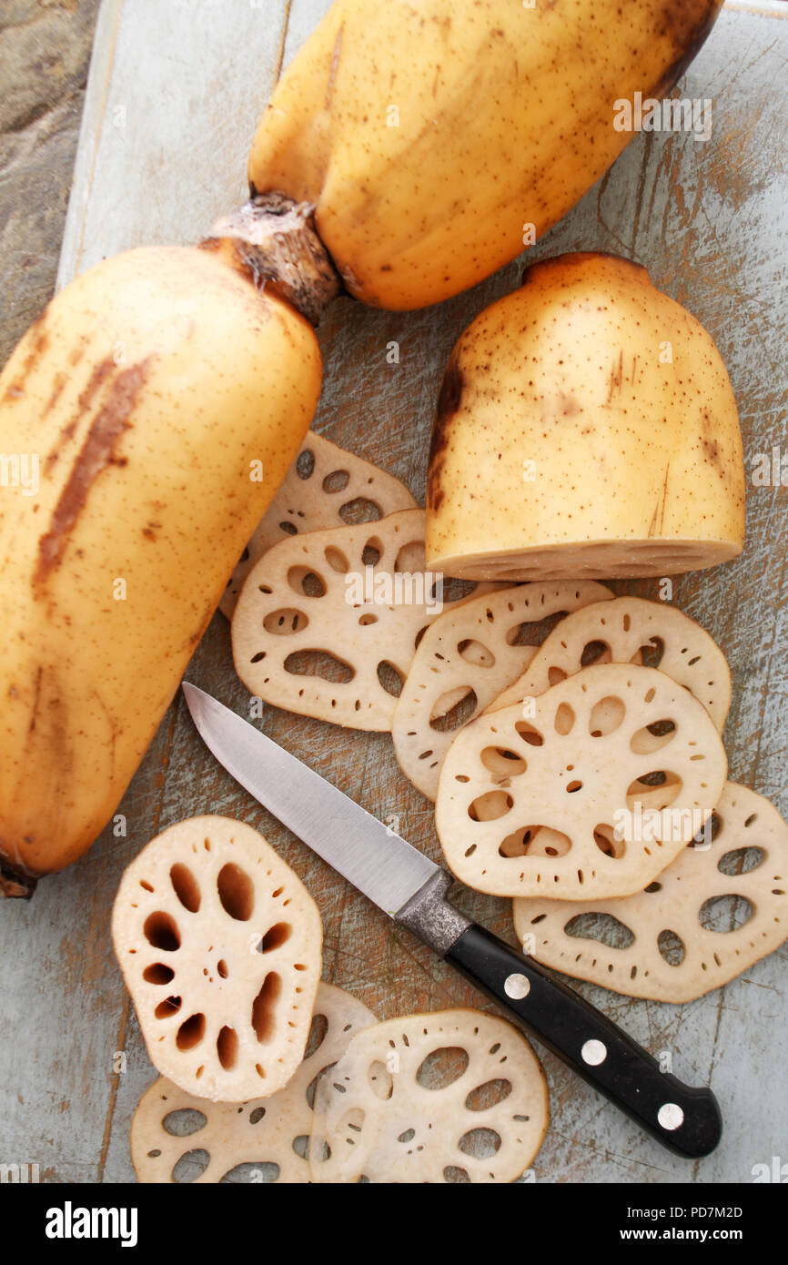 preparing lotus root vegetable Stock Photo - Alamy