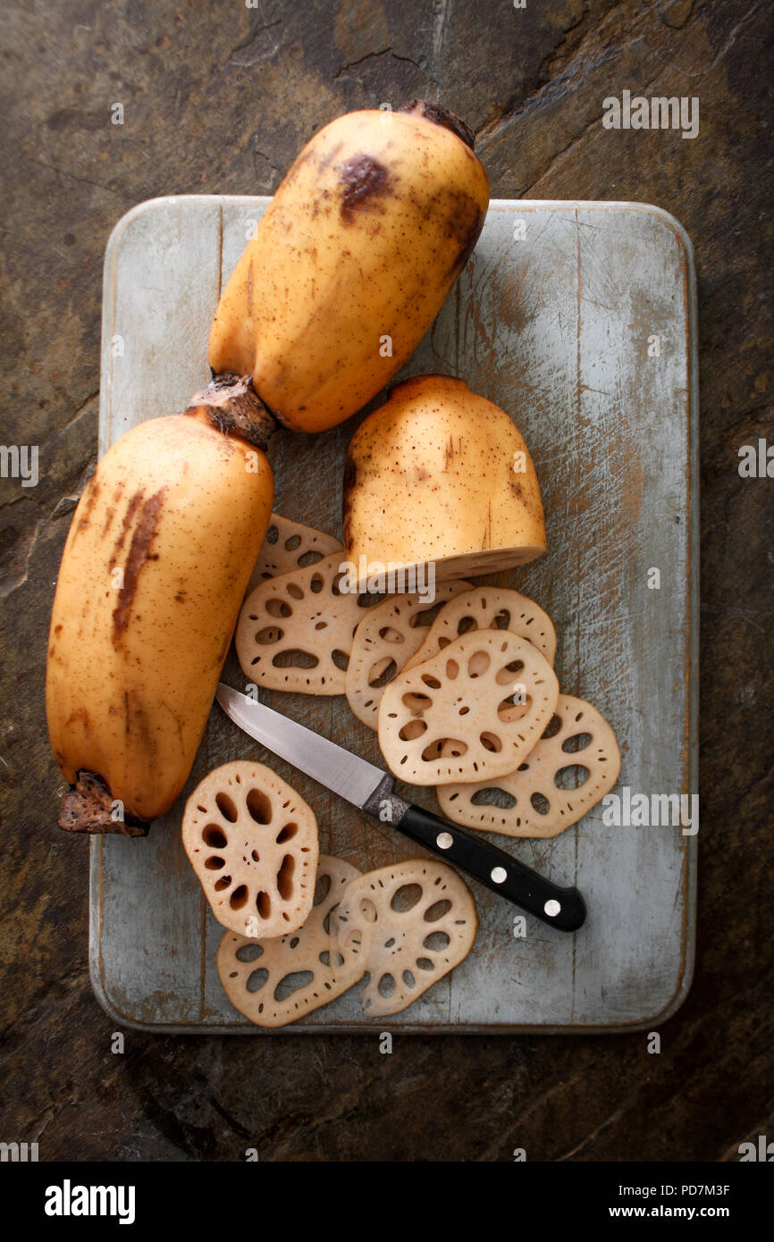 preparing lotus root vegetable Stock Photo - Alamy