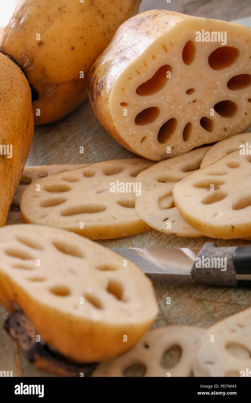 preparing lotus root vegetable Stock Photo - Alamy