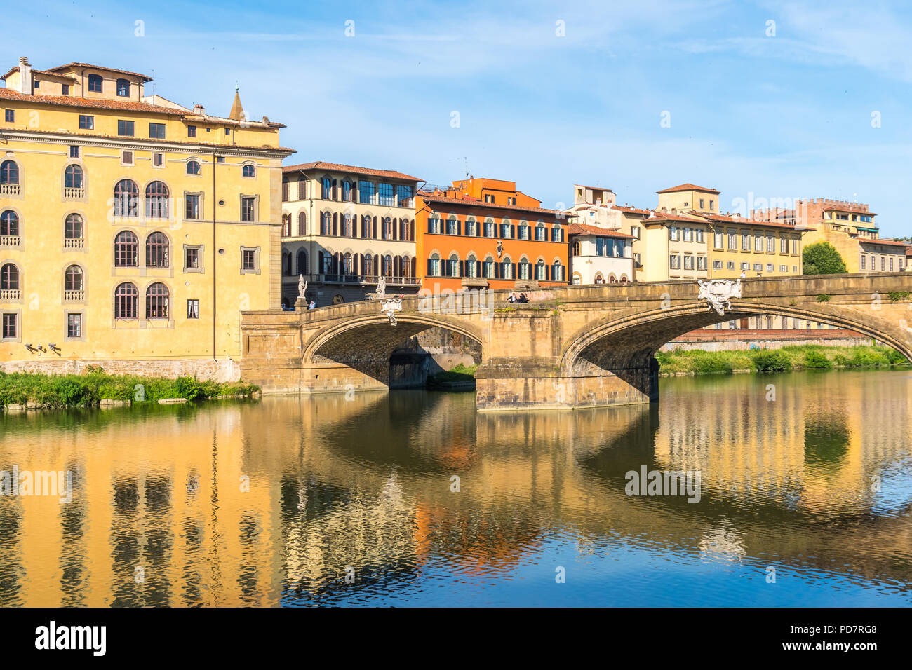 Colorful old buildings line the Arno River in Florence, Italy Stock ...