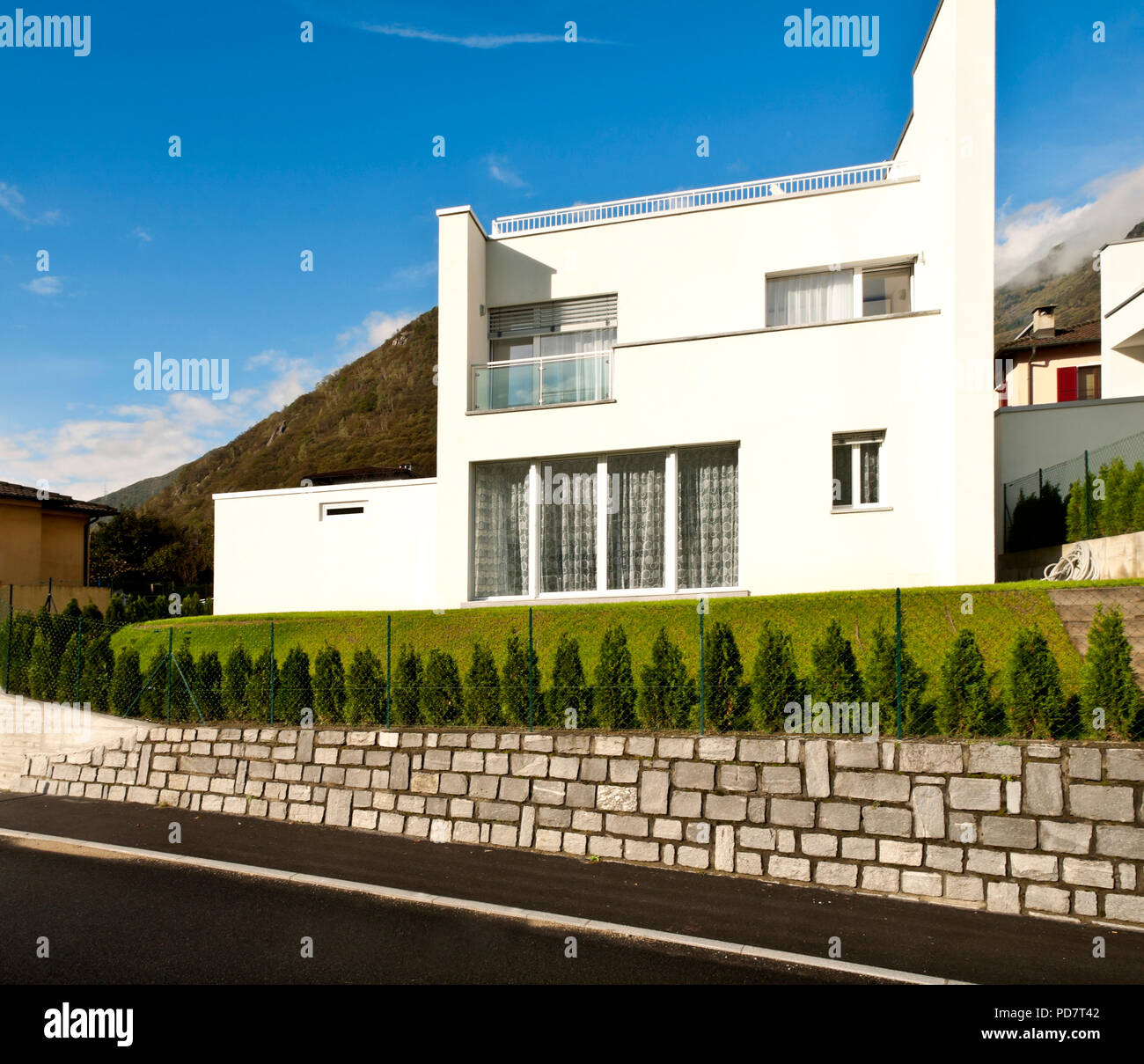 white house view from the road, sunset scene Stock Photo - Alamy