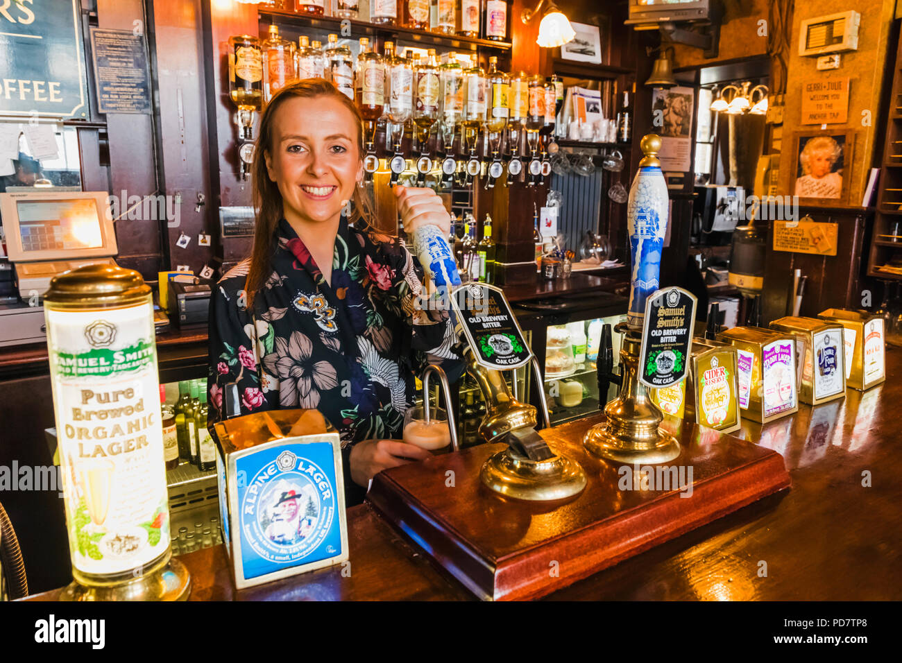 England, London, Southwark, Anchor Tap Pub, Barmaid Serving Beer Stock ...