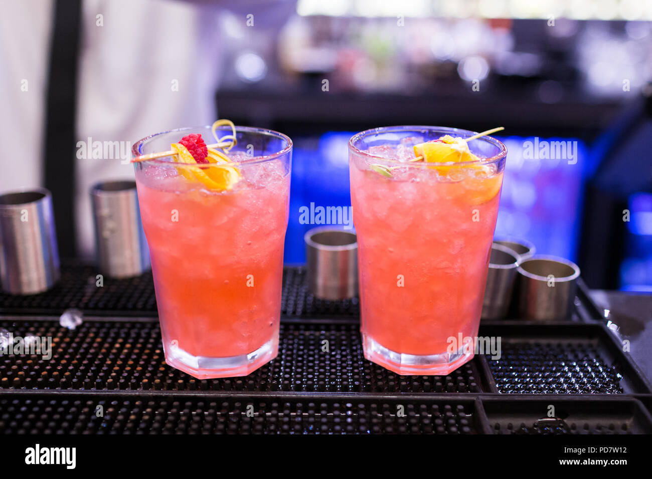 Cocktails presented on a bar in a nightclub Stock Photo - Alamy