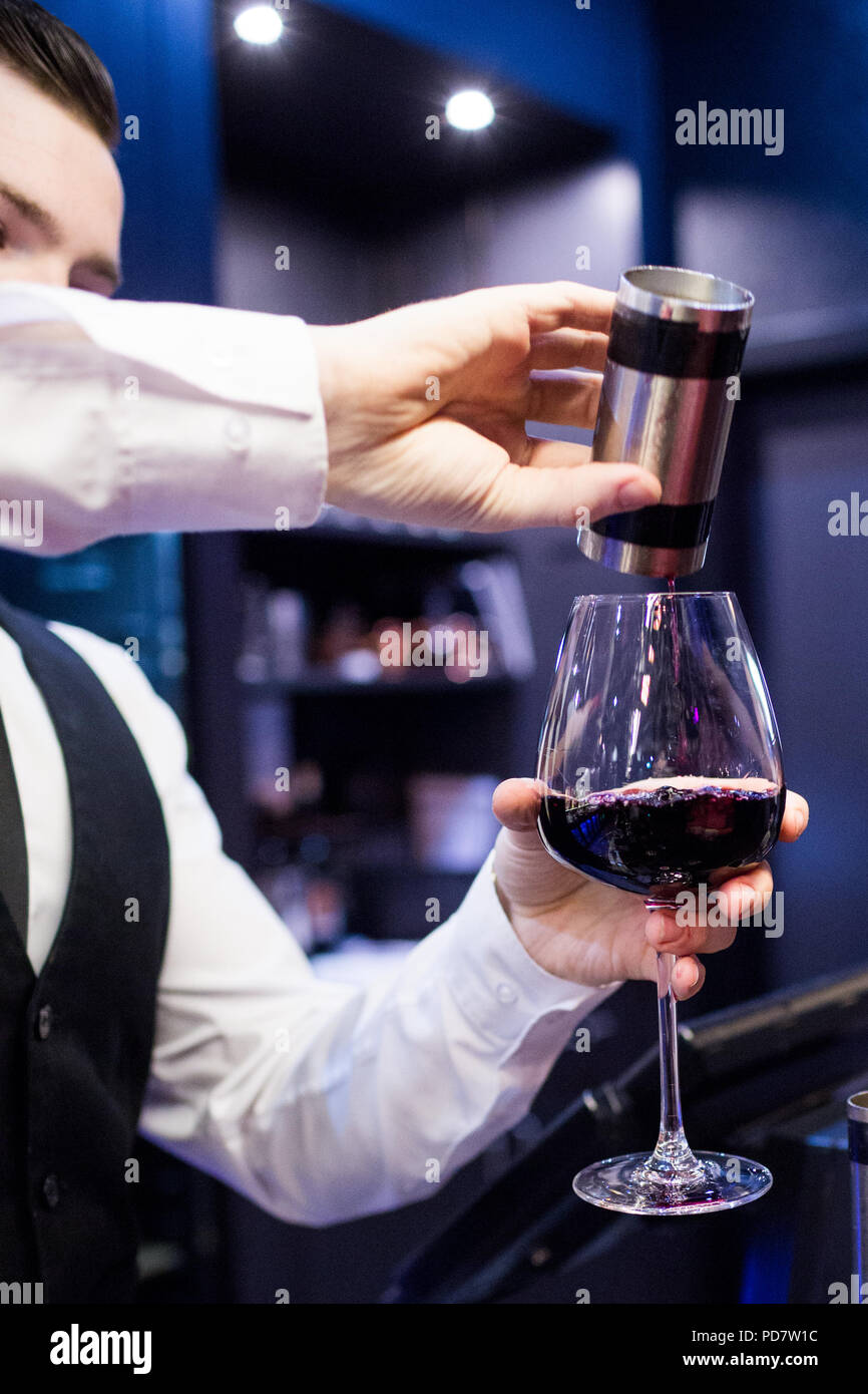 Bartender preparing drinks for customers hi-res stock photography and ...