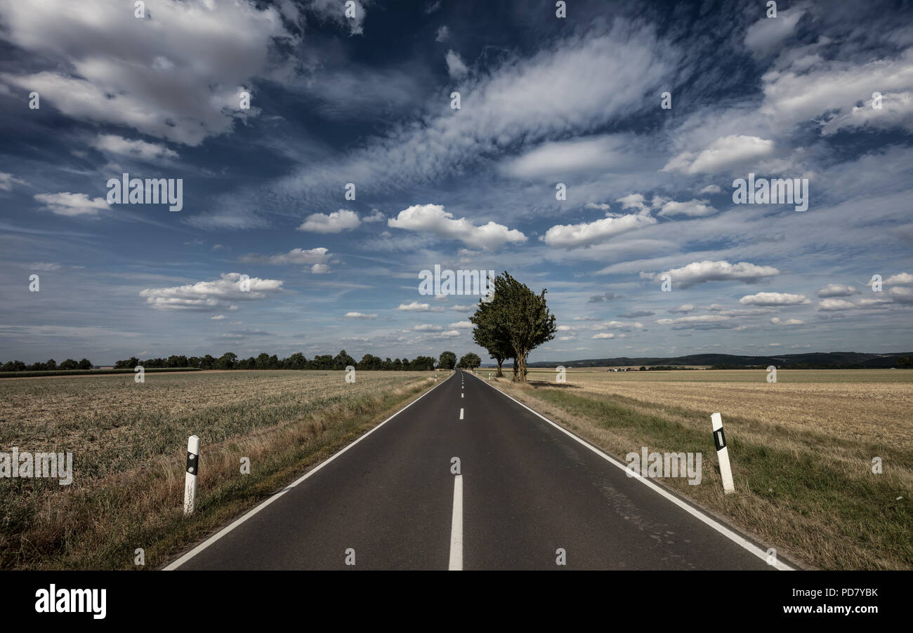Endless country road in Germany Stock Photo - Alamy