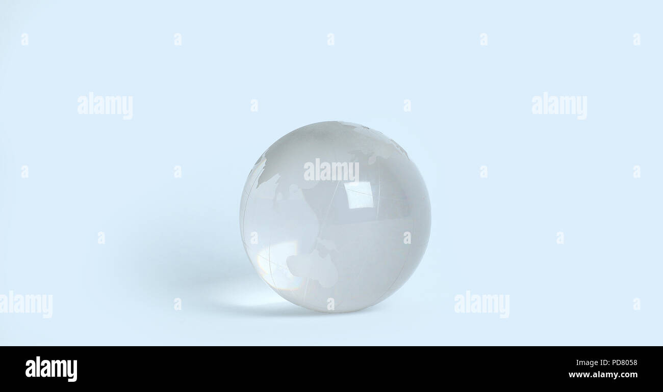 small glass globe.isolated on a white background.photo with copy space ...