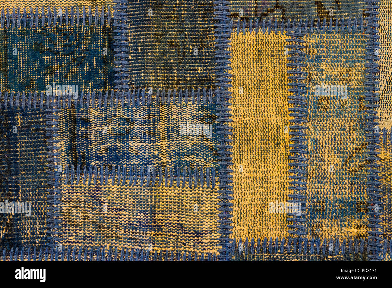 Texture of a piece of old carpet to sew thick threads Stock Photo - Alamy