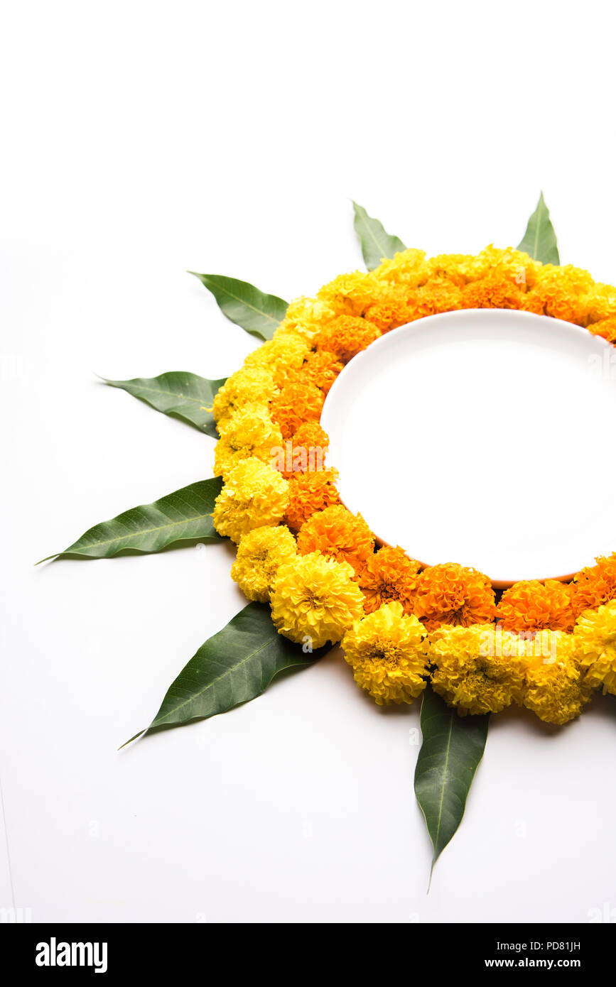 Flower Rangoli for Diwali or Pongal Festival made using Marigold or ...