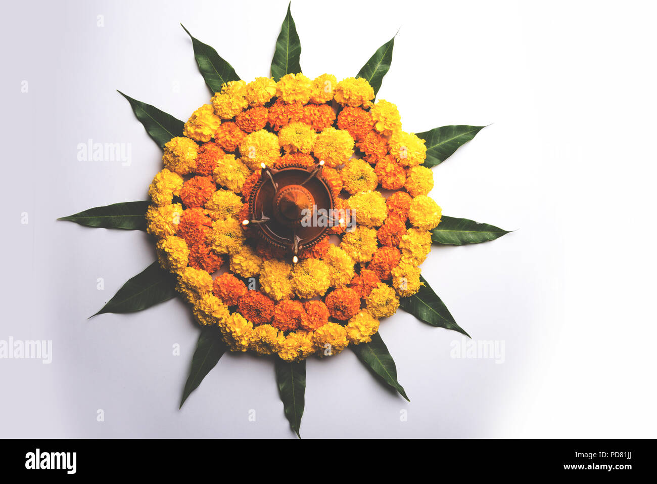 Flower Rangoli for Diwali or Pongal Festival made using Marigold or ...