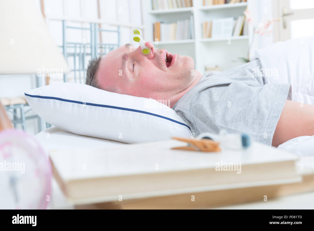 Napping man man sleeping snoring hi-res stock photography and images ...