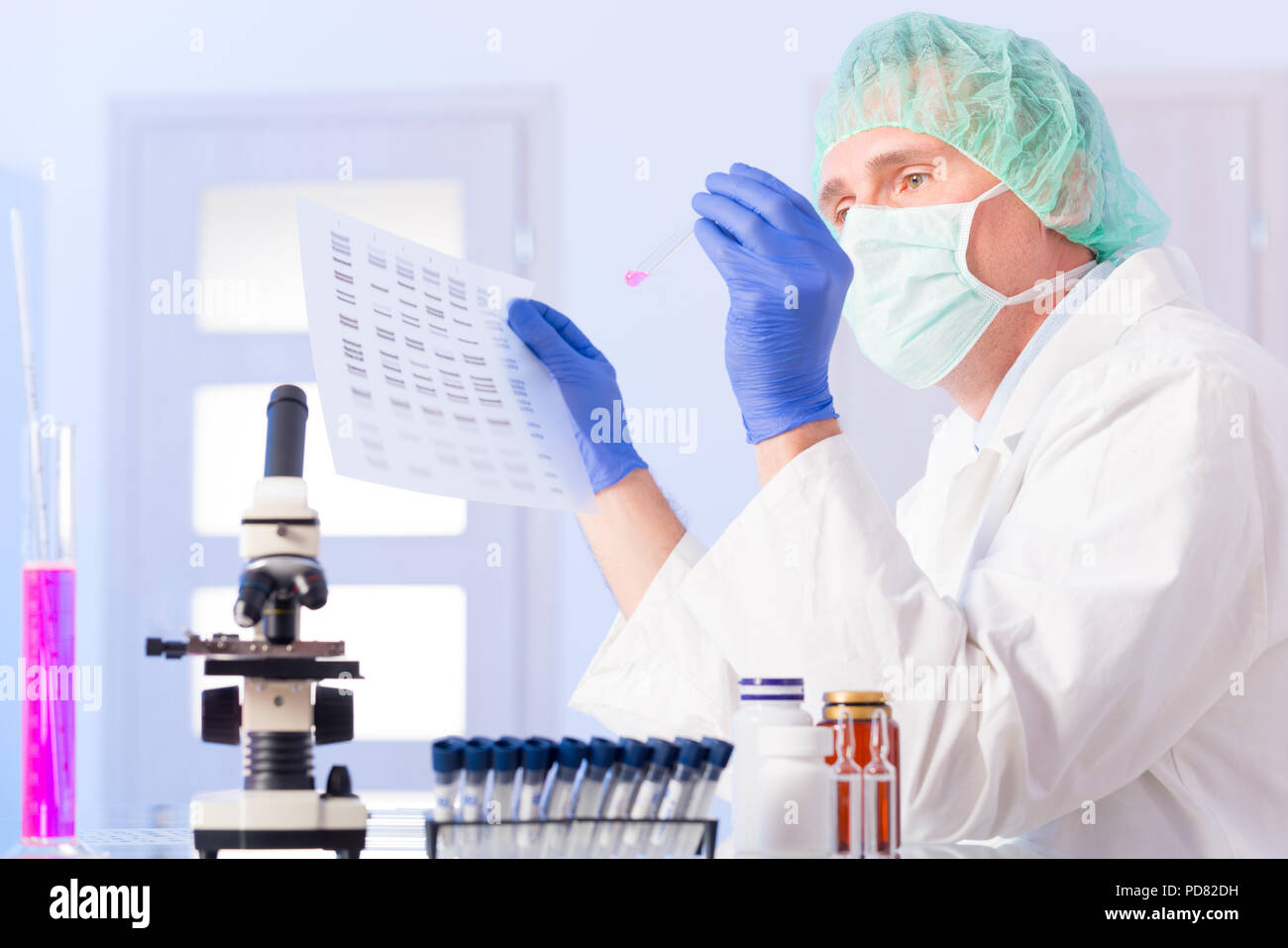 Scientist analizing DNA sequence Stock Photo - Alamy