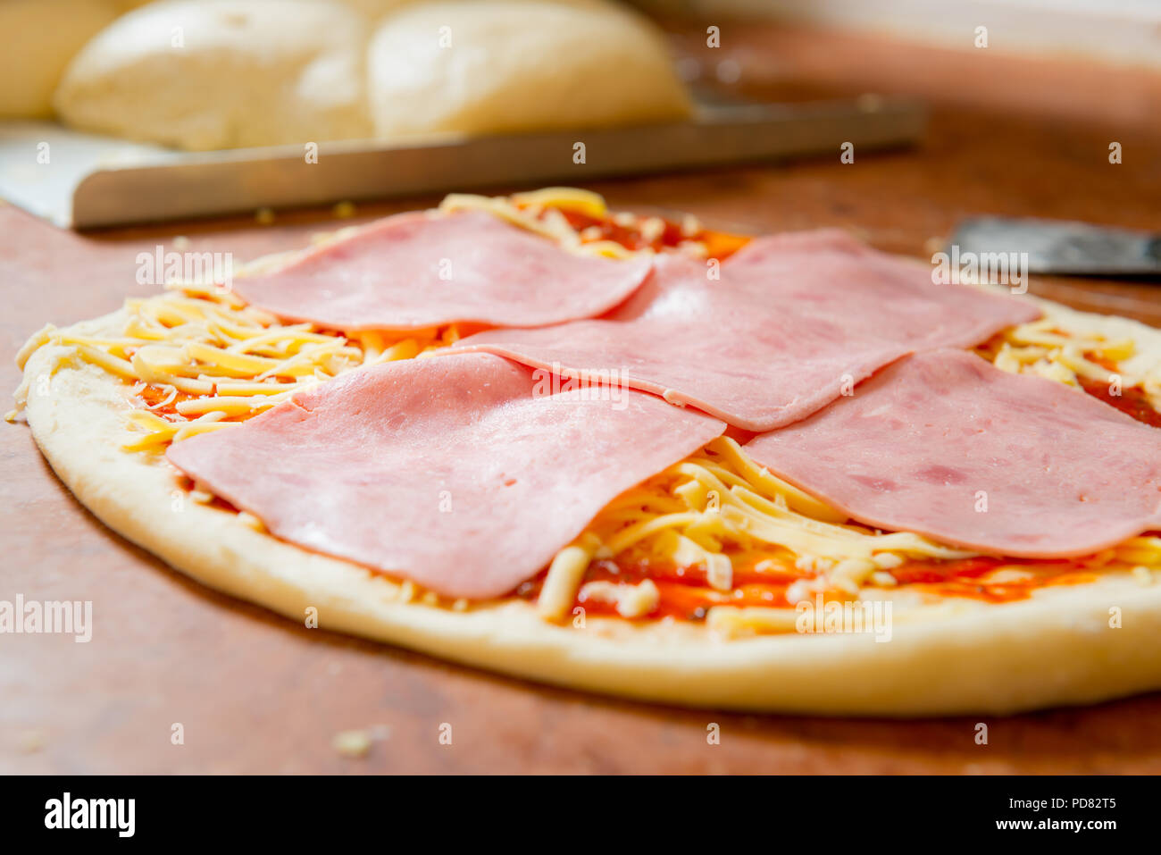 Fresh original Italian raw pizza, preparation in traditional style ...