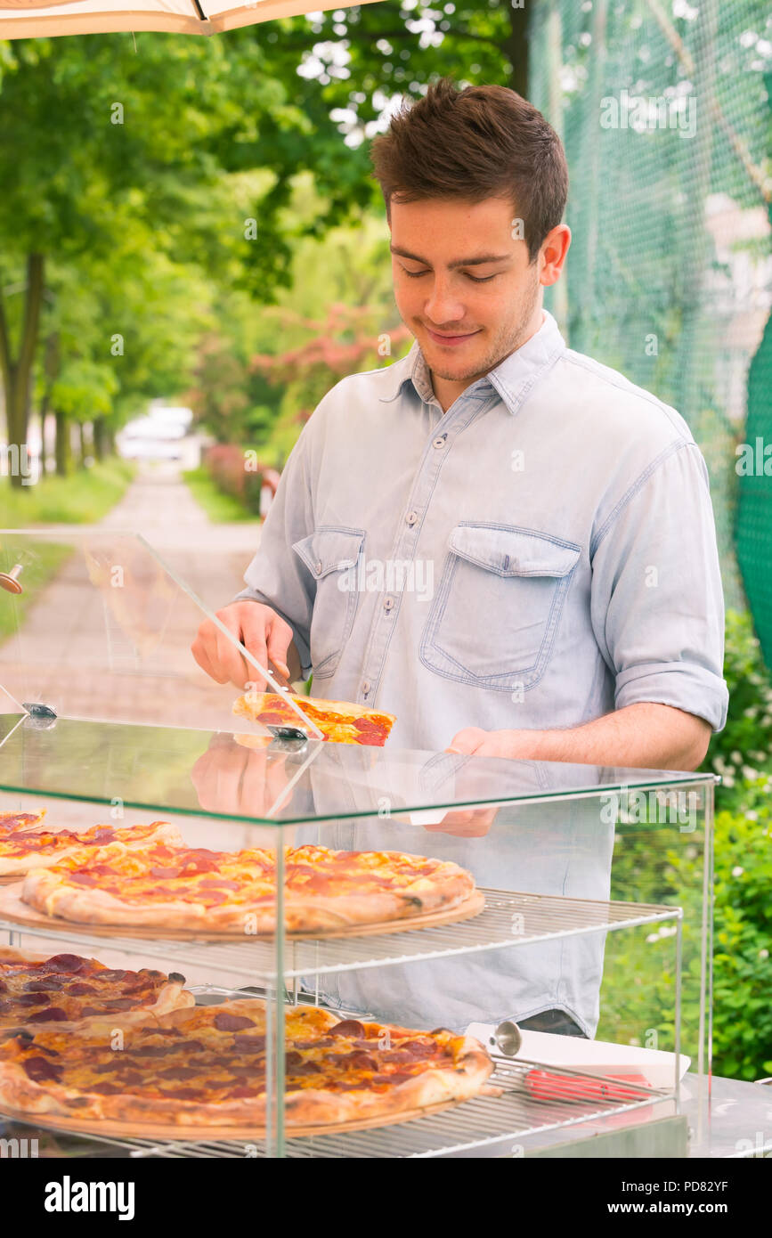 Street food vendor selling pizza hi-res stock photography and images ...