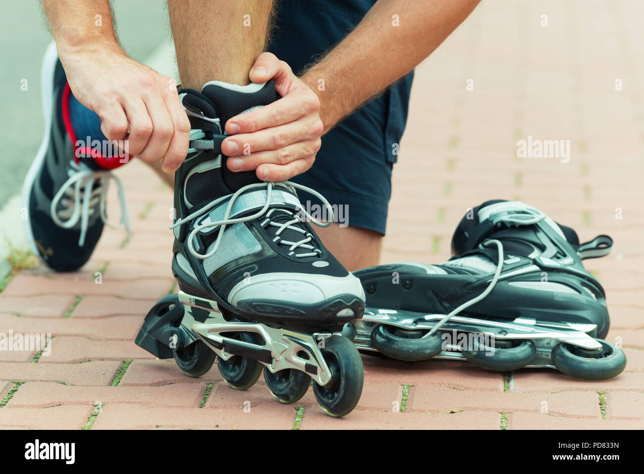 Man on roller blades hi-res stock photography and images - Alamy