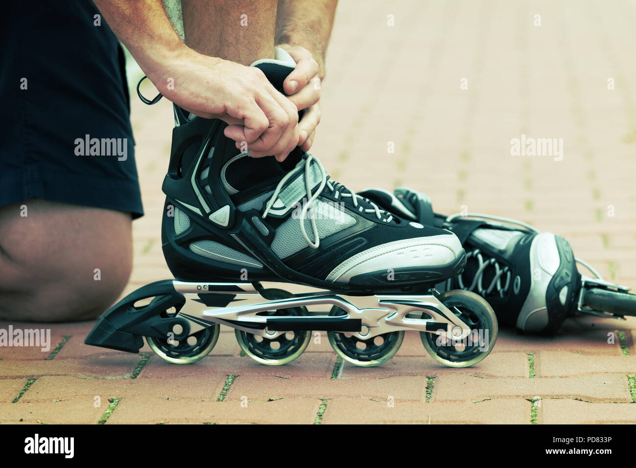 Man on roller blades hi-res stock photography and images - Alamy