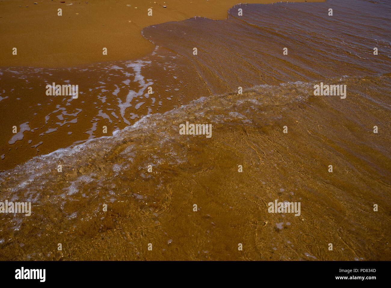 Xi beach red sand hi-res stock photography and images - Alamy
