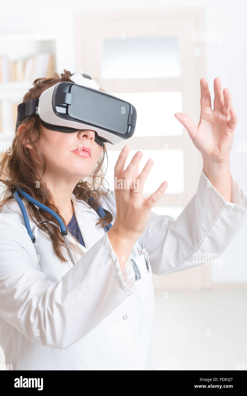 Female physician using virtual reality hi-res stock photography and ...