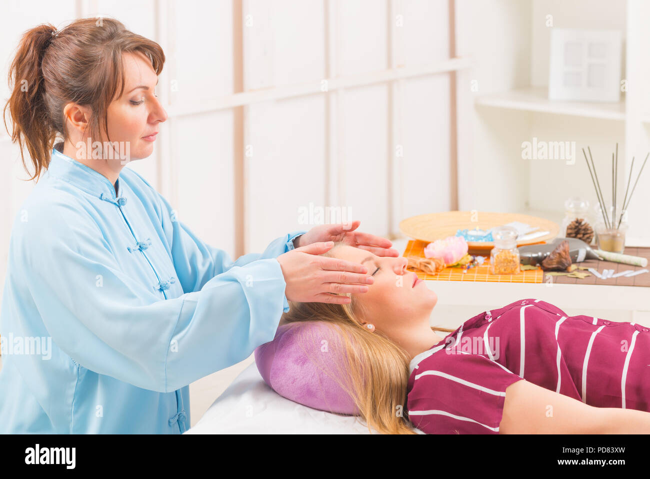 Reiki laying hi-res stock photography and images - Alamy