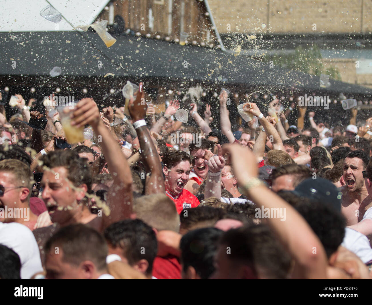 Football fans gather at Flat Iron Square in London's Southwark to watch ...