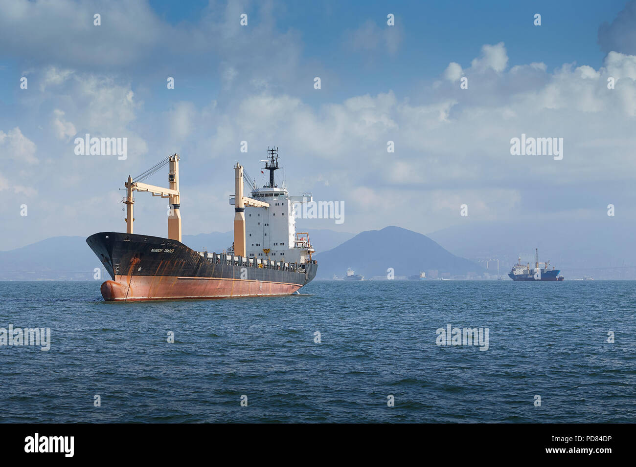 The Small Cargo/Container Ship, MUNICH TRADER, Anchored In Victoria ...