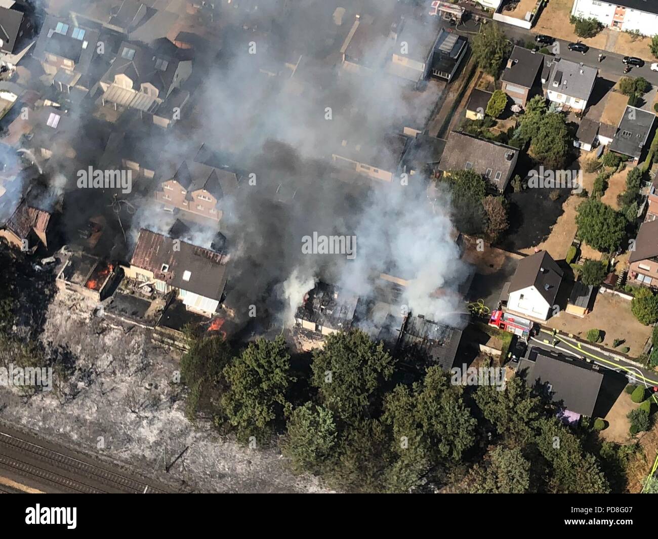 Siegburg, Germany. 07th Aug, 2018. Smoke rises from the roof trusses of ...