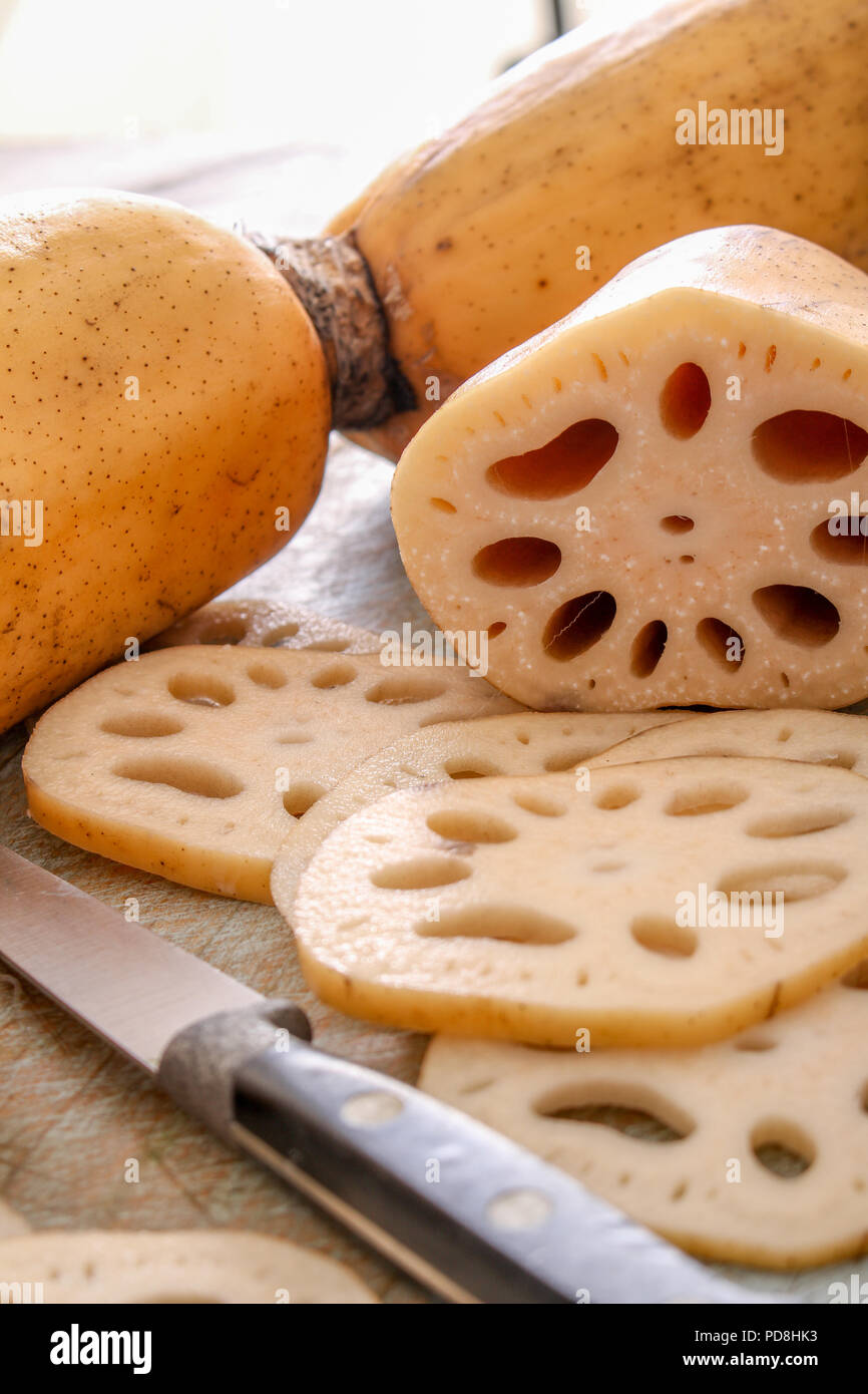 preparing lotus root vegetable Stock Photo - Alamy