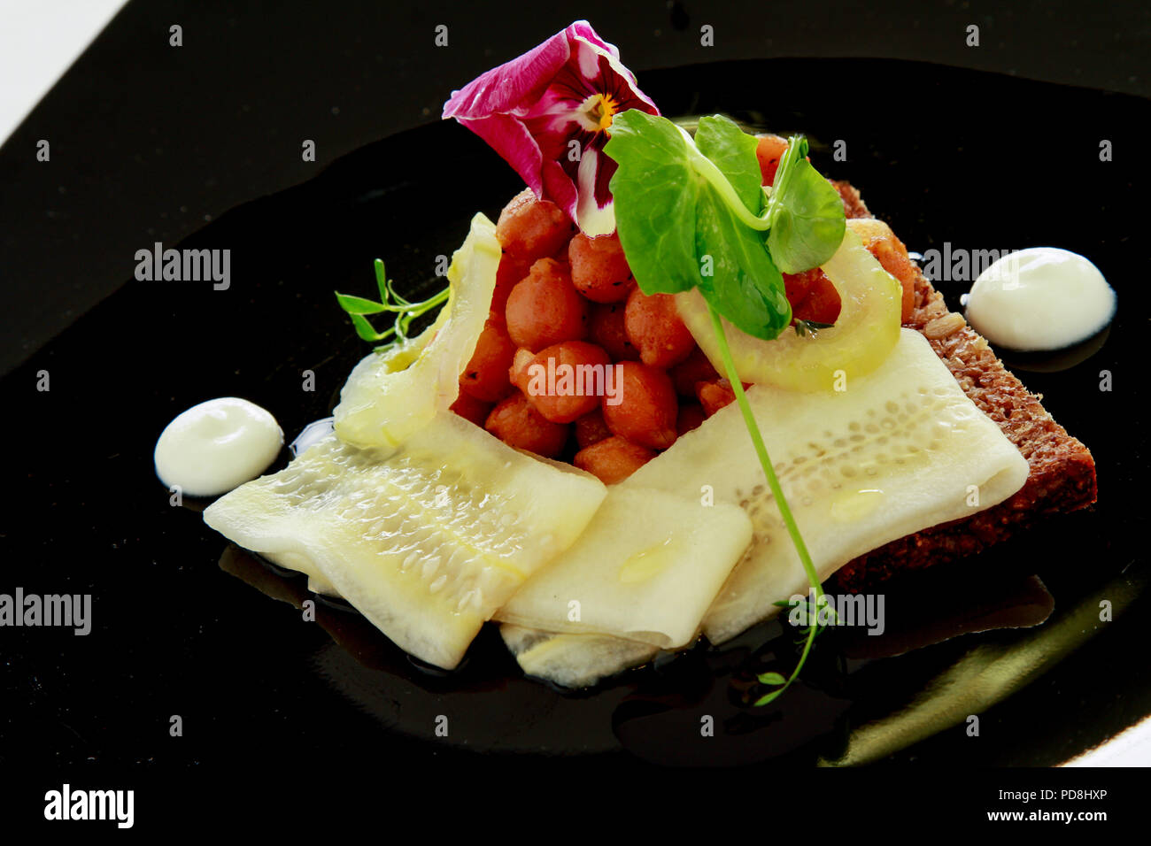 spicy chickpea with cucumber appetizer Stock Photo - Alamy