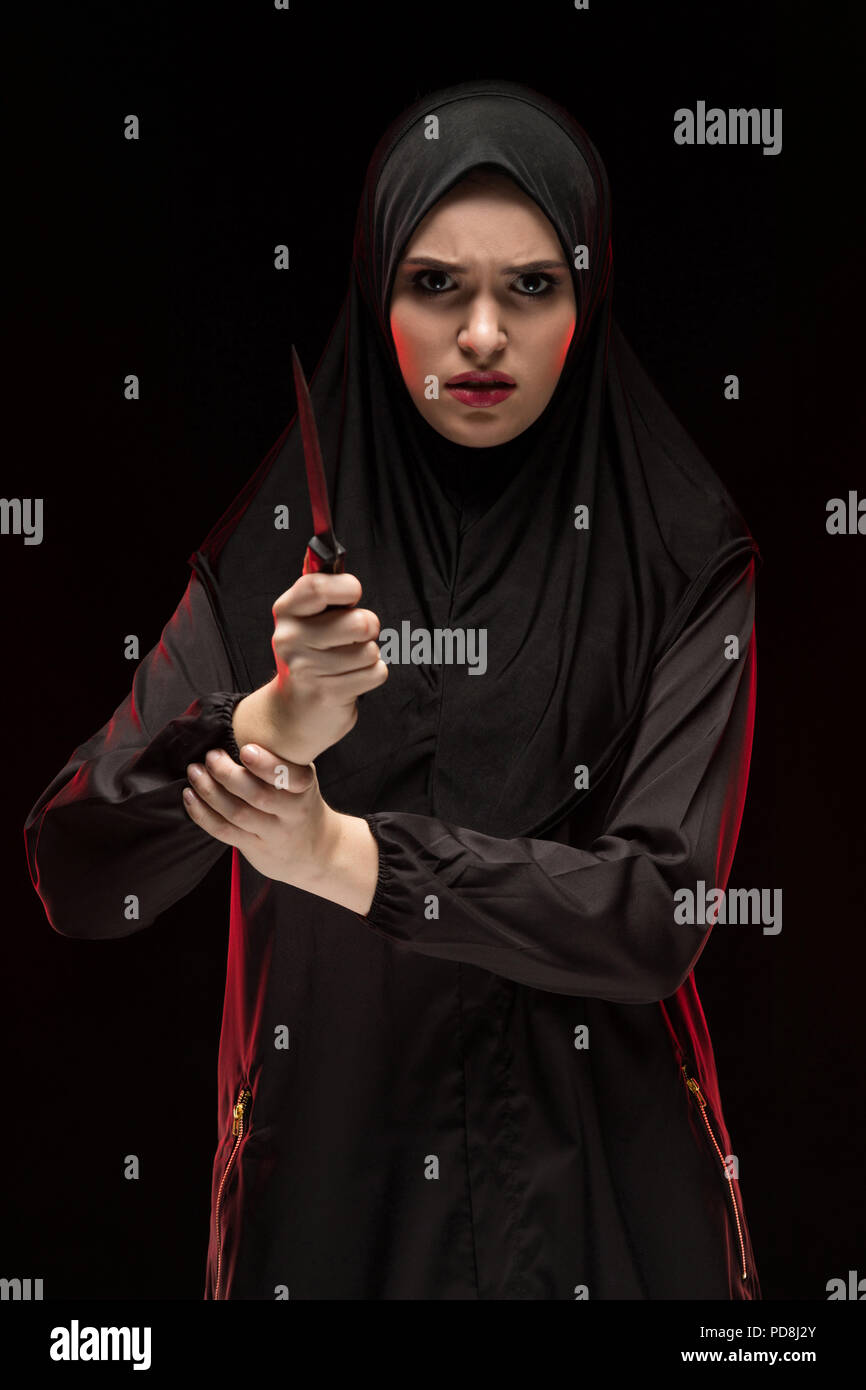 Portrait of beautiful desperate scared frightened young muslim woman ...