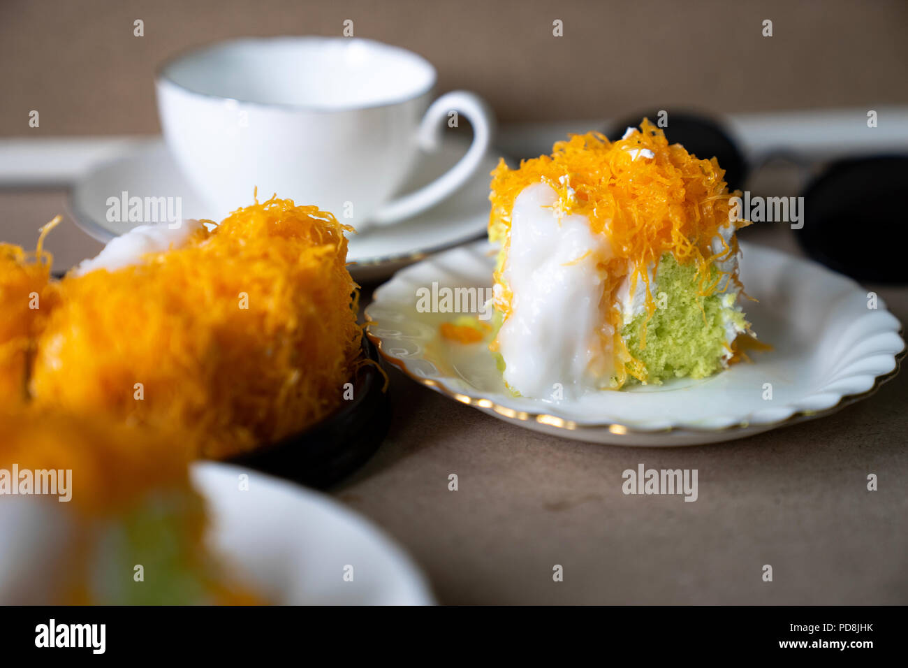 close up selective focus piece of Gold Egg Yolk Thread Cake , or 'Cake ...