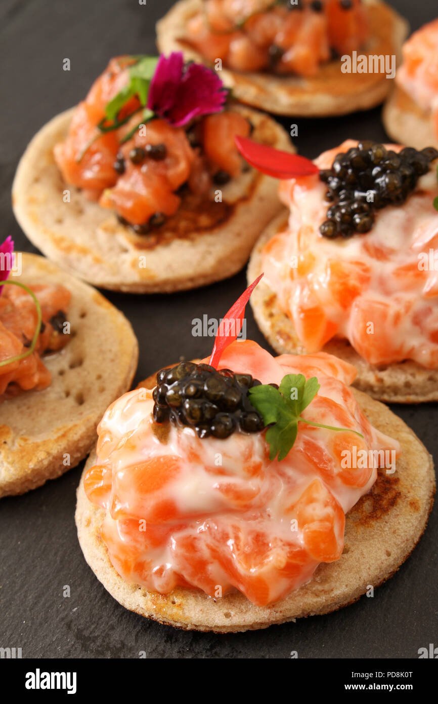 smoked salmon blinis canapes Stock Photo - Alamy